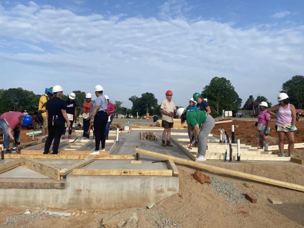 Women volunteers help build a home in west Charlotte - CJC